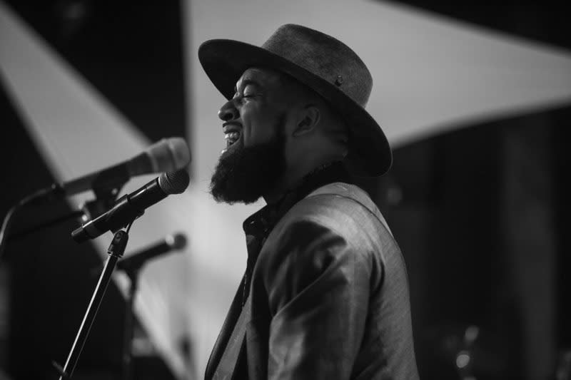 Nelson Cade III performs live at The 8 x 10 Baltimore, MD | Visit Baltimore